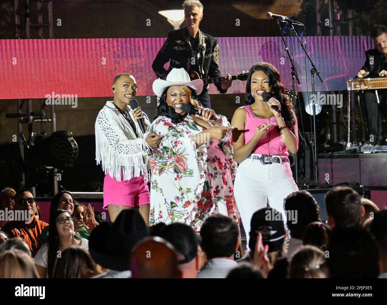 Trea Swindle, left, Danica Hart and Devynn Hart of Chapel Hart perform ...