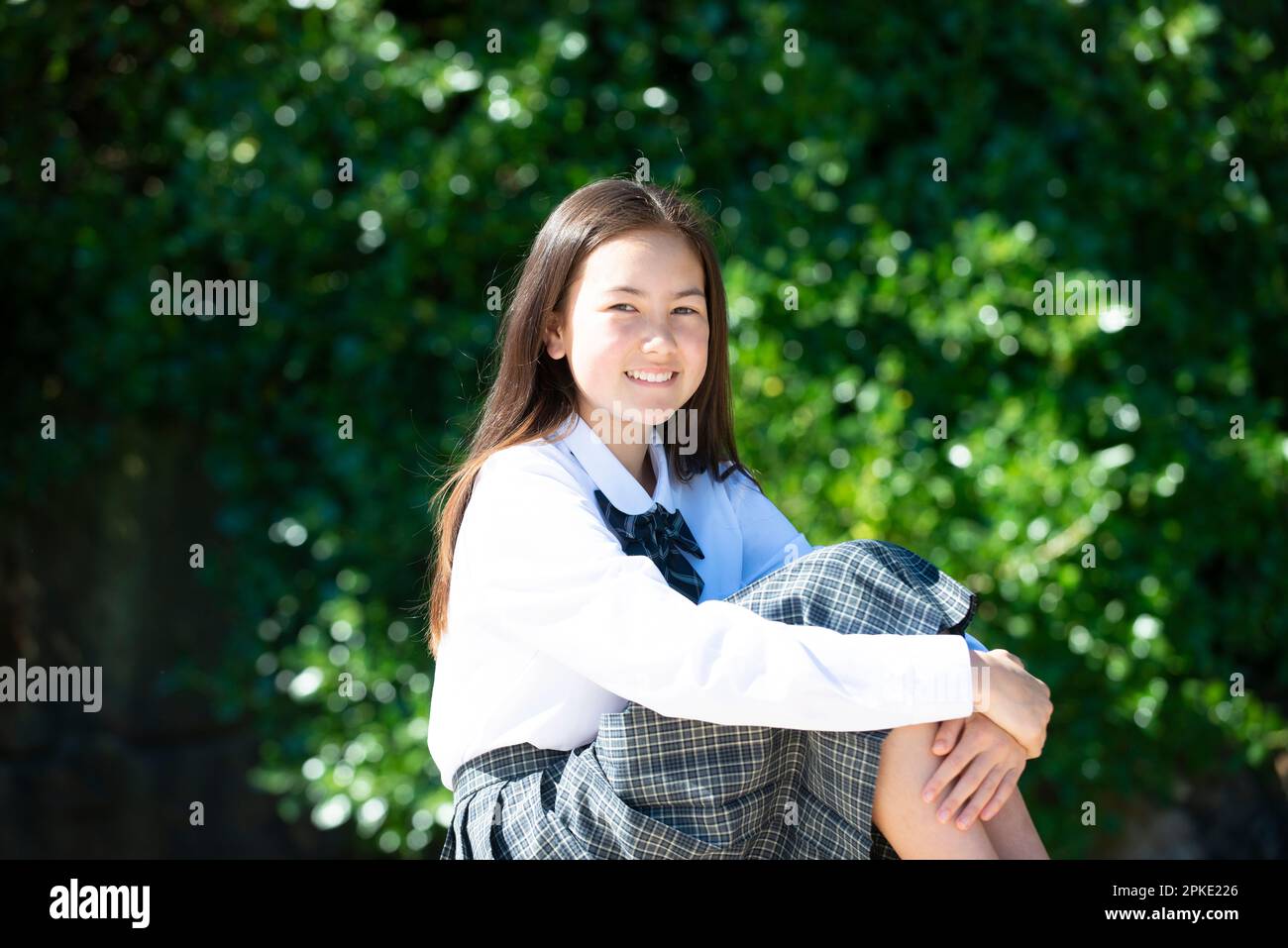 Green school uniform -Fotos und -Bildmaterial in hoher Auflösung – Alamy
