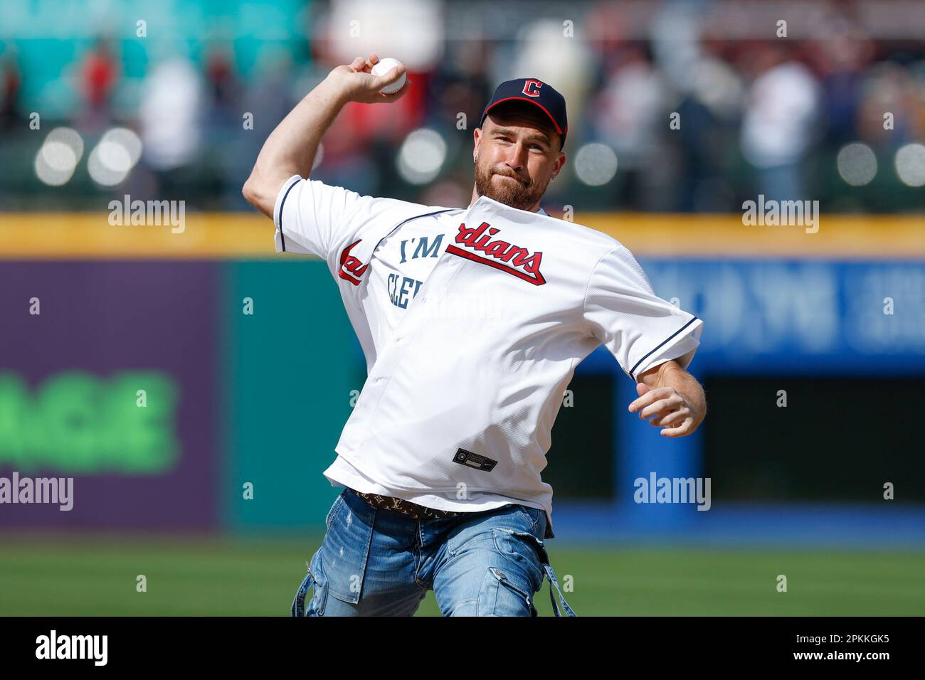 Kansas City Chiefs tight end Travis Kelce throws out the ceremonial first pitch before a ...