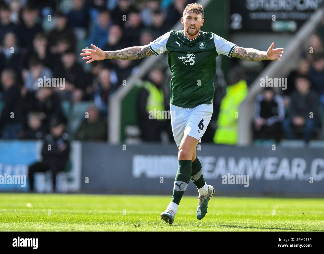 Dan Scarr #6 of Plymouth Argyle Defending during the Sky Bet League 1 ...