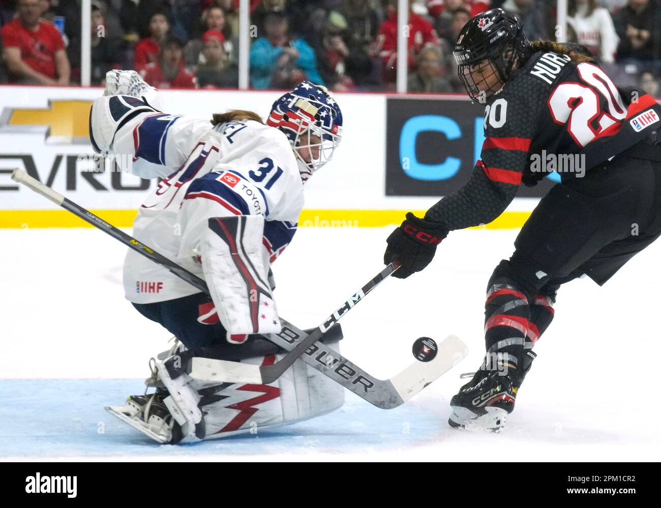 Canada forward Sarah Nurse (20) is stopped by United States goaltender ...