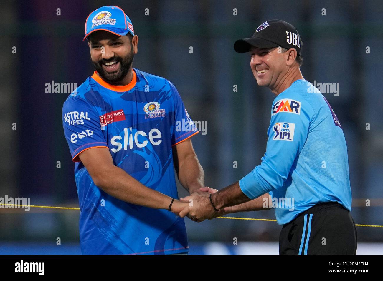Mumbai Indians's captain Rohit Sharma talks to Delhi Capitals' coach ...