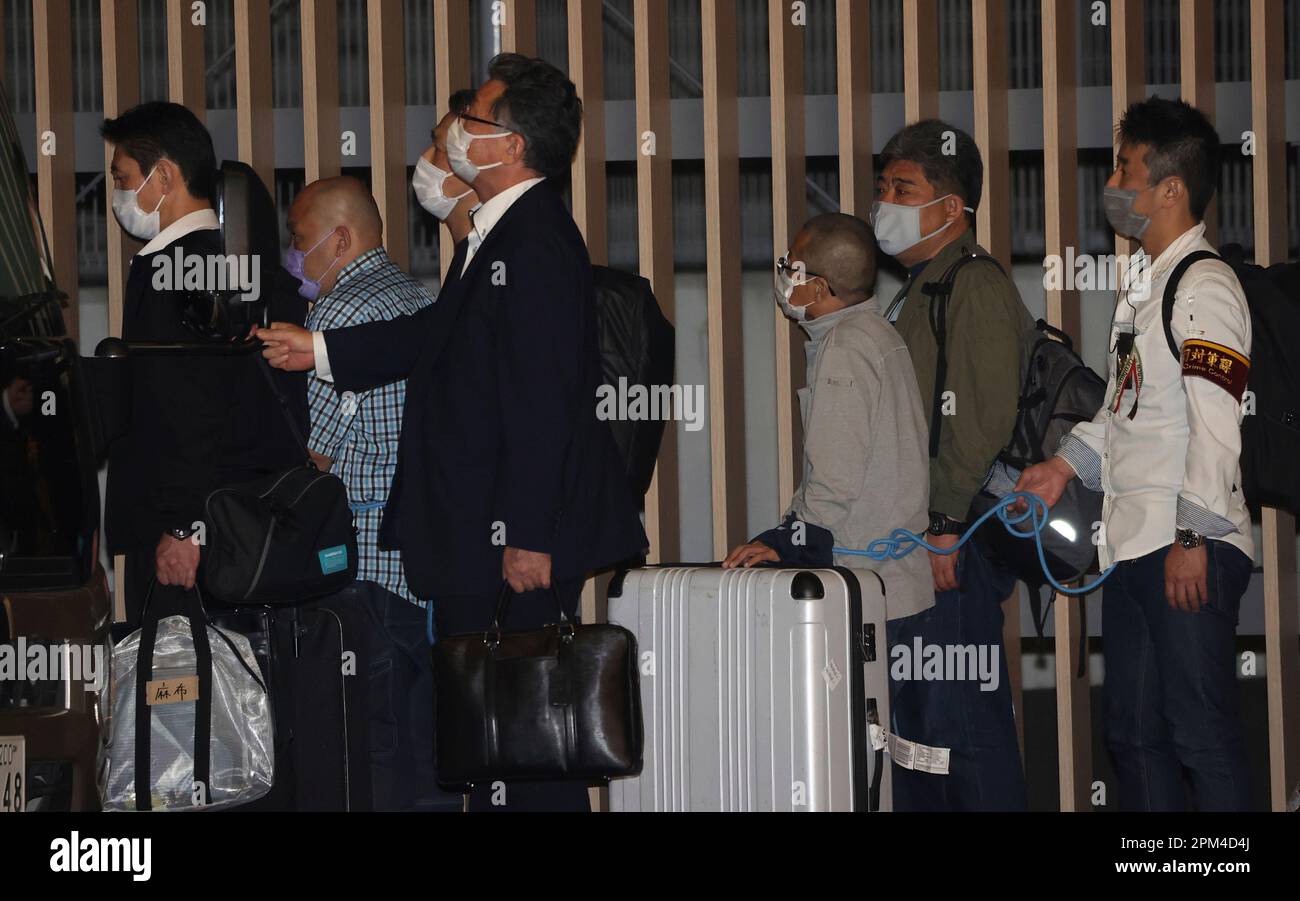 Nineteen Japanese fraud suspects are extradited from Cambodia at Haneda ...