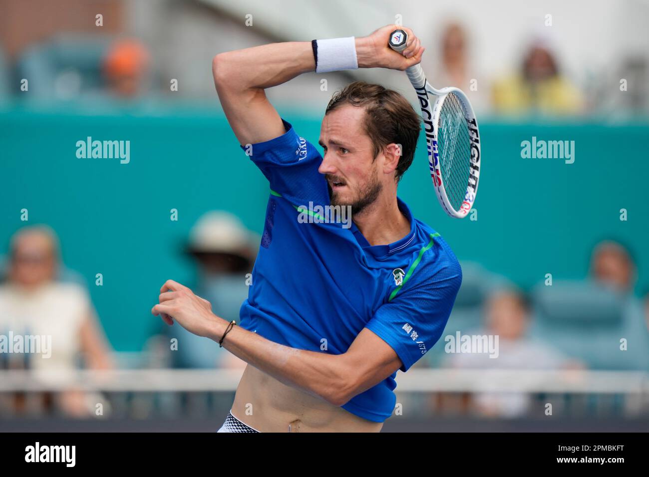 Daniil Medvedev, of Russia, returns a shot from Jannik Sinner, of Italy ...