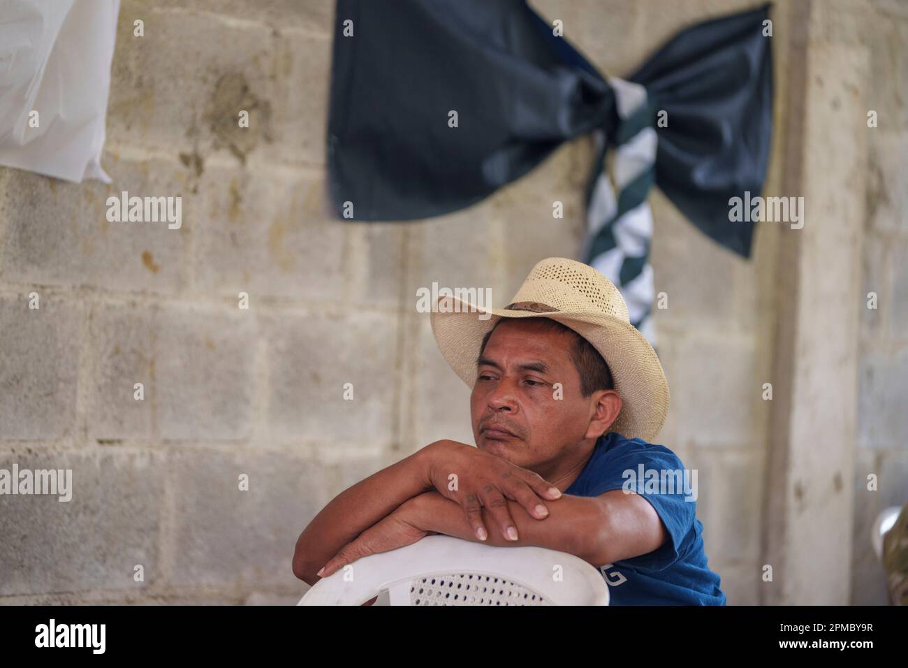 RETRANSMISSION TO CORRECT YEAR TO 2023 - A neighbor attends the wake of ...