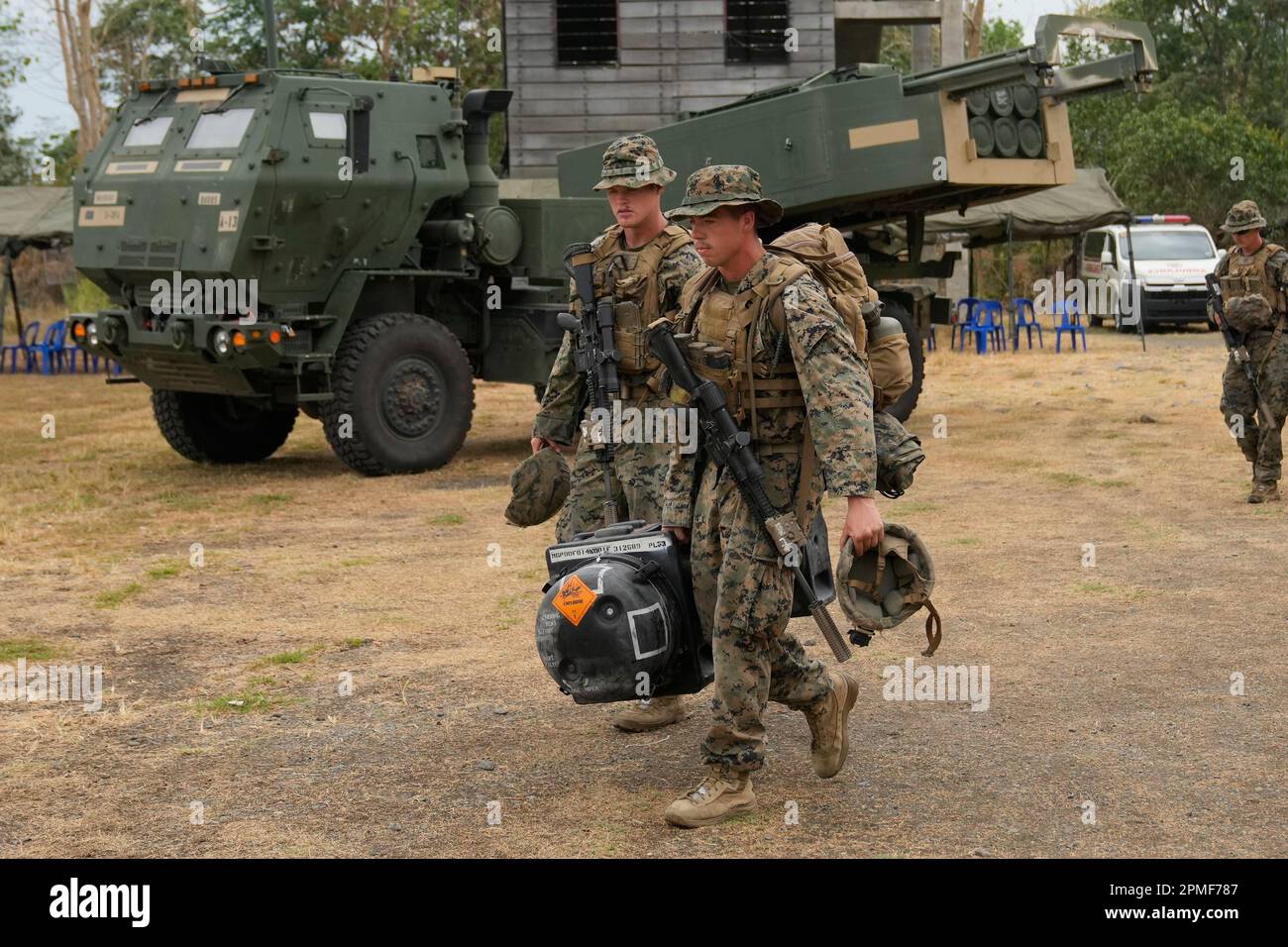 U.S. soldiers carry a Javelin shoulder-launched anti-tank missile past ...