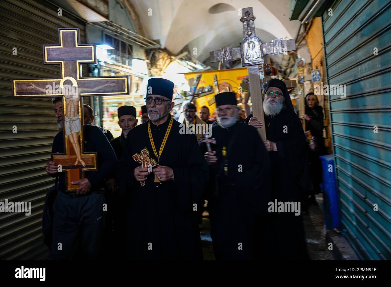 Orthodox Christian worshippers carry crosses during a Good Friday ...