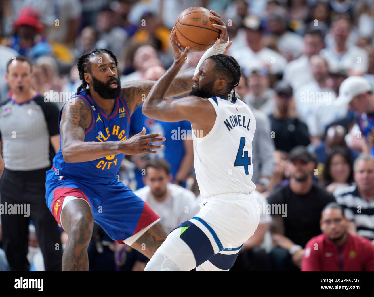 Minnesota Timberwolves guard Jaylen Nowell, right, looks to pass the ...