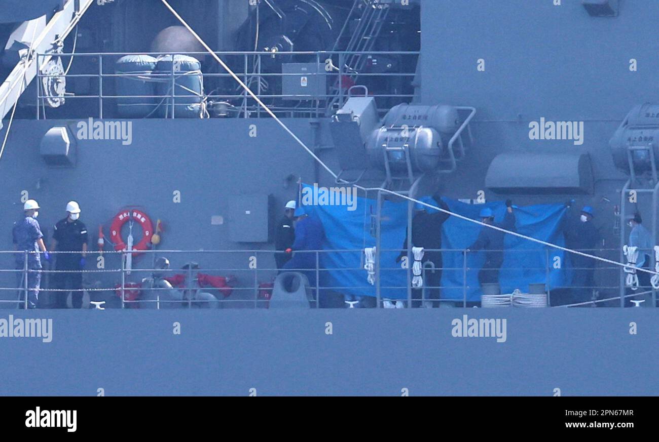 Crew members of the Chihaya, a submarine rescue ship of the Japan ...