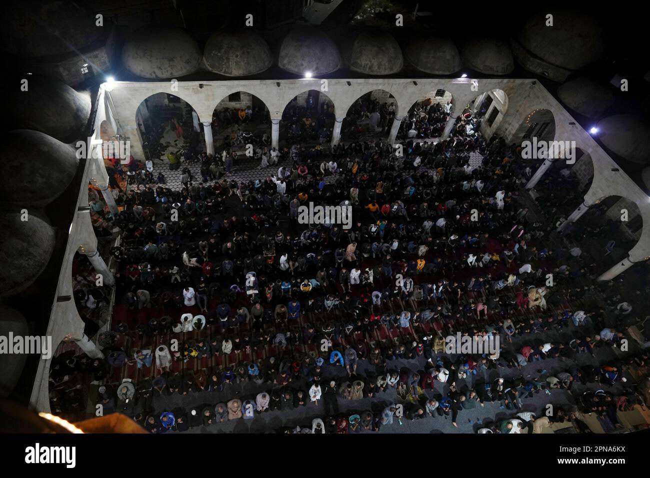 Palestinian Muslim worshippers pray during Laylat al-Qadr, also known ...
