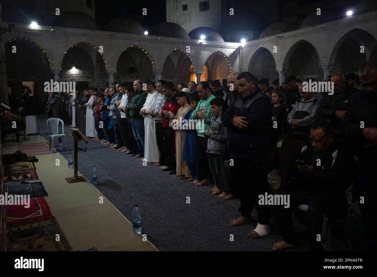 Palestinian Muslim worshippers pray during Laylat al-Qadr, also known ...