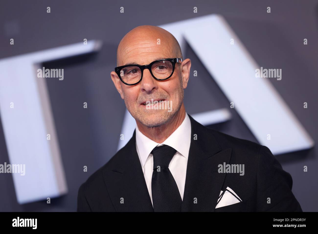 Stanley Tucci poses for photographers upon arrival at the premiere of ...