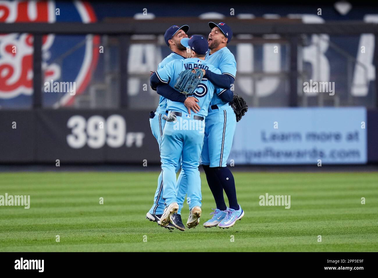 Toronto Blue Jays' George Springer, right, Daulton Varsho, center, and ...