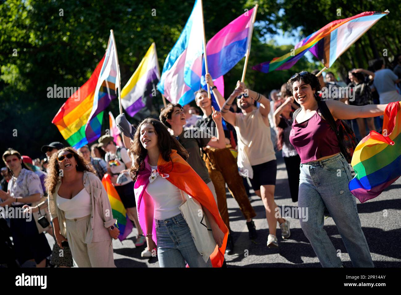 Demonstrators carry LGBT, Transgender and Non-binary flags during ...