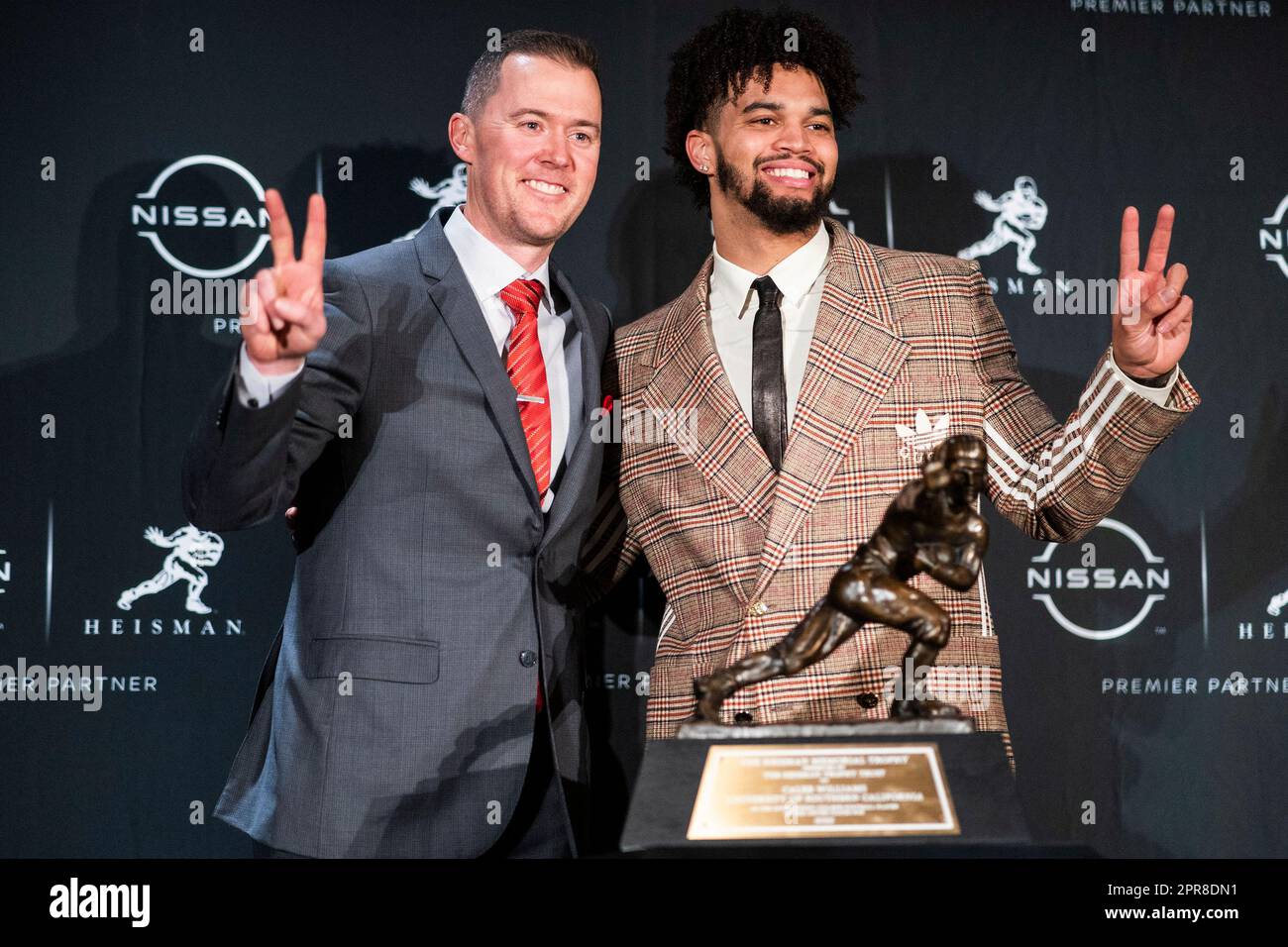 FILE - Southern California quarterback Caleb Williams, right, and head ...