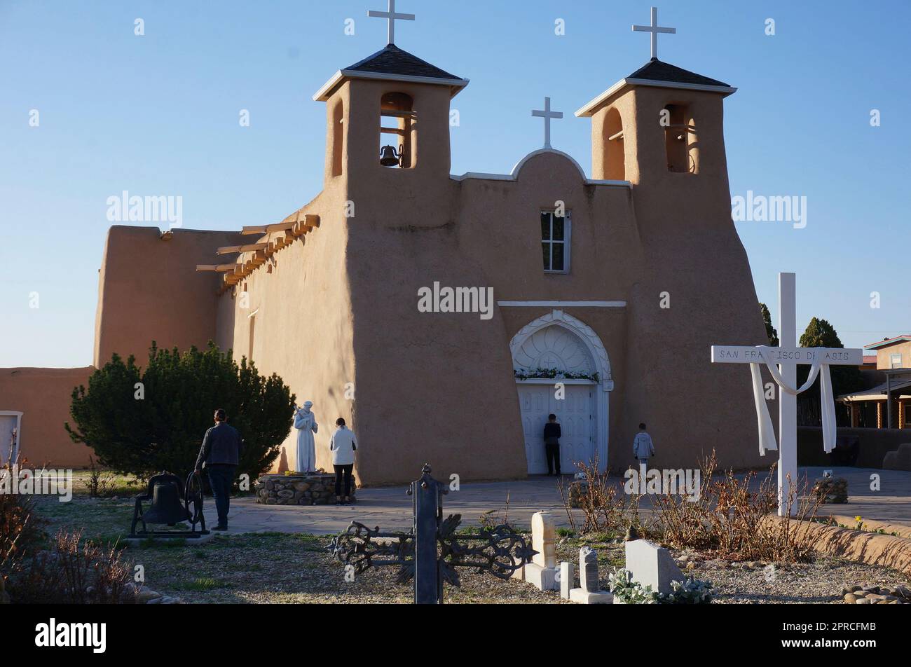 Mass goers going in San Francisco de Asís Mission Church located in ...