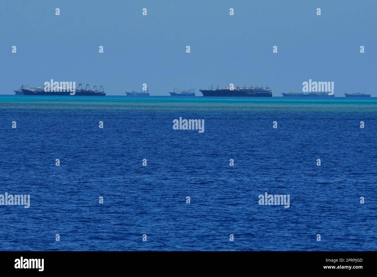 Some of the many suspected Chinese militia ships stay near the ...