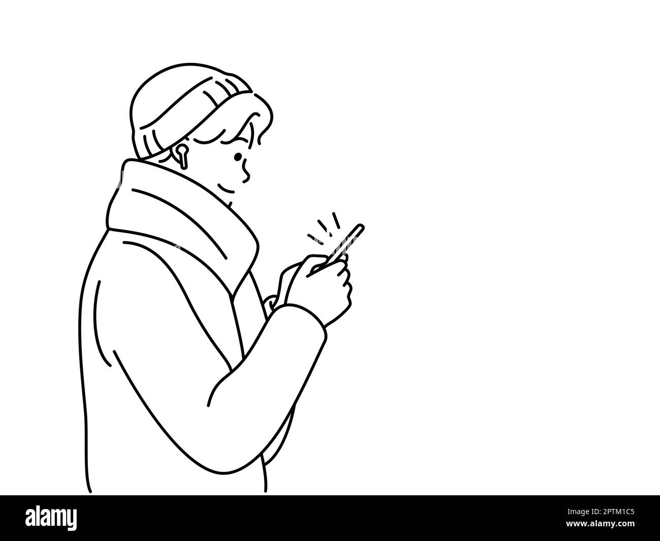 Ein junger Mann mit Kopfhörern benutzt ein Handy, das auf die Metro ...