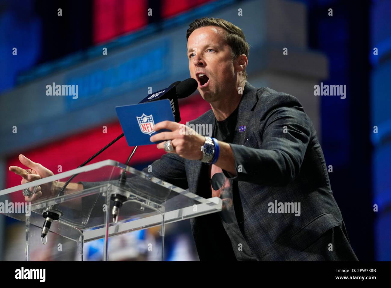 Lawrence Tynes announces the No. 57 pick for the New York Giants at the ...