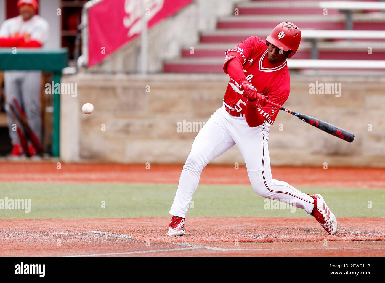 BLOOMINGTON, IN - APRIL 30: Indiana infielder Devin Taylor (5) connects ...