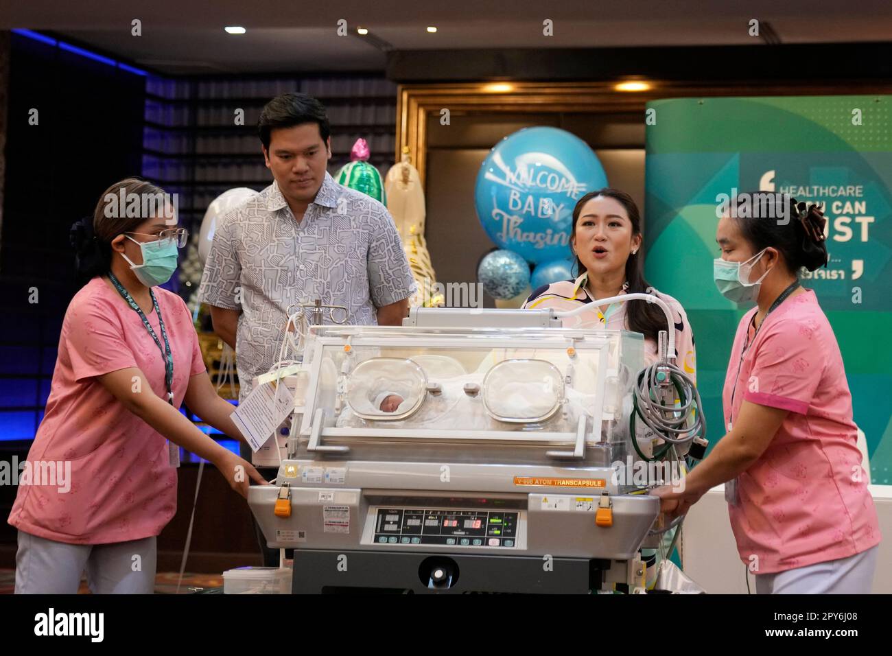 Paetongtarn Shinawatra, center, a leading Thai politician and youngest daughter of exiled former ...