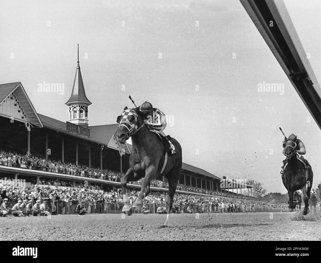 FILE - Secretariat, with jockey Ron Turcotte up, passes the twin spires ...