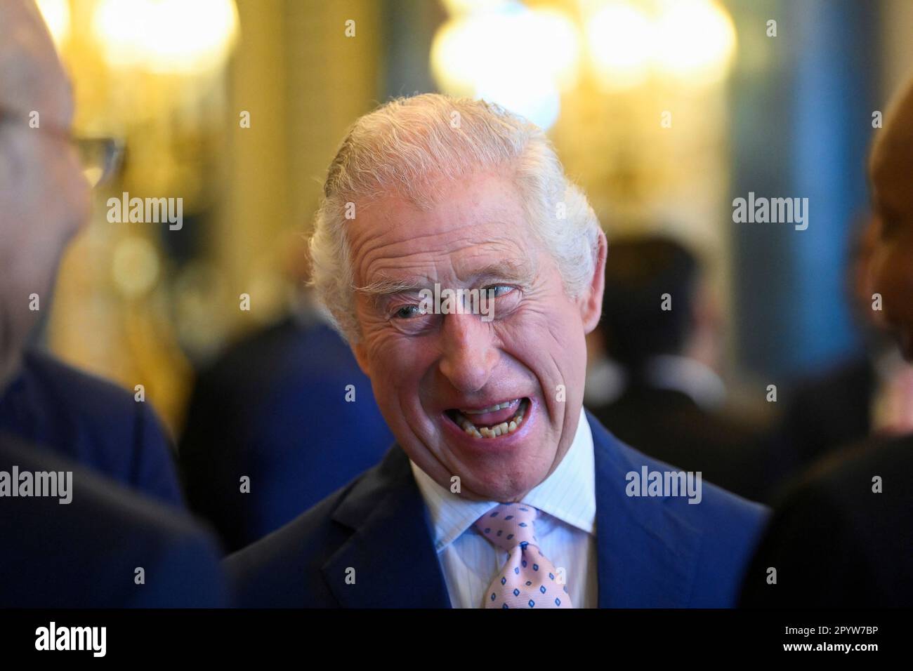 Britain's King Charles III laughs as he attends a Realm Governors ...
