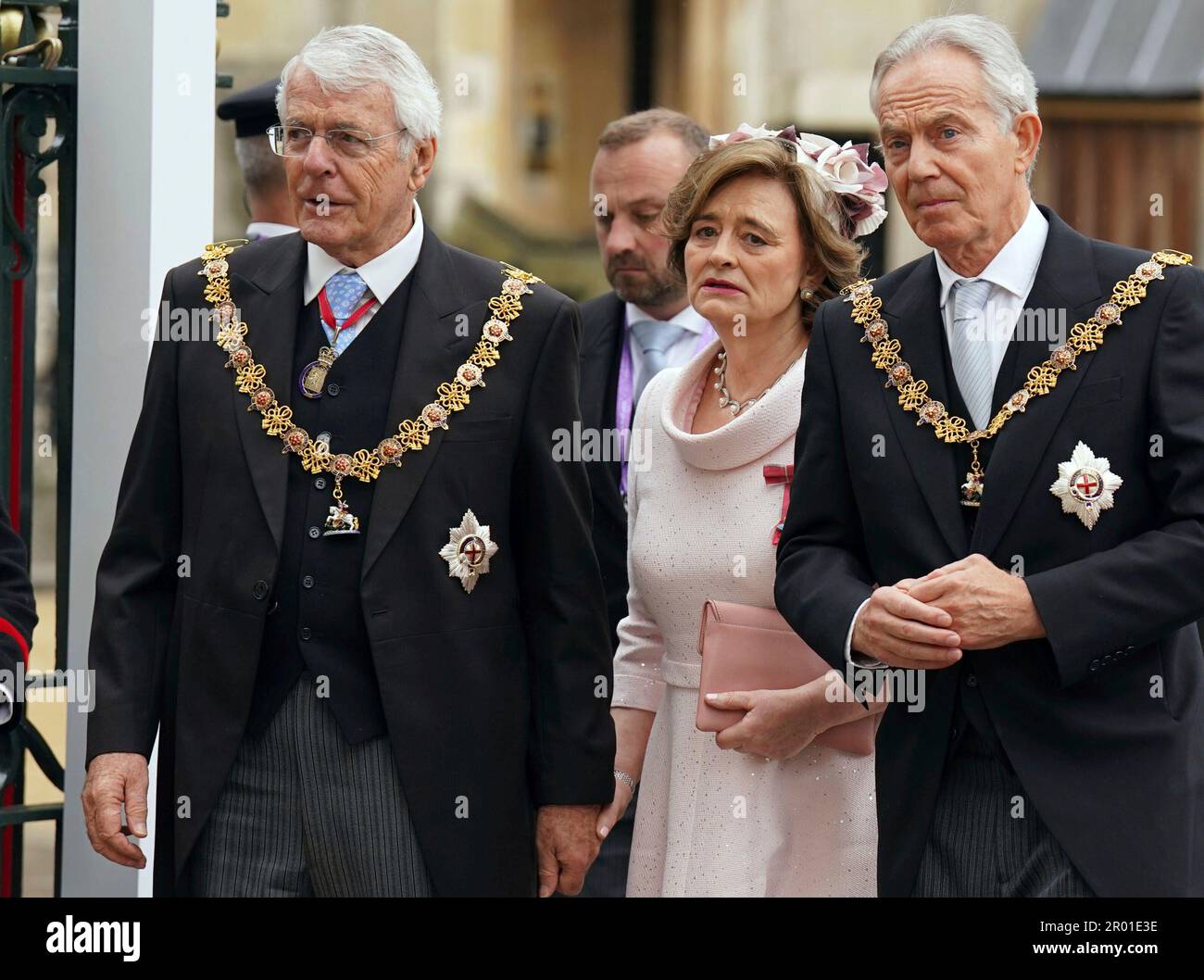 Former prime ministers John Major and Tony Blair with his wife Cherie ...