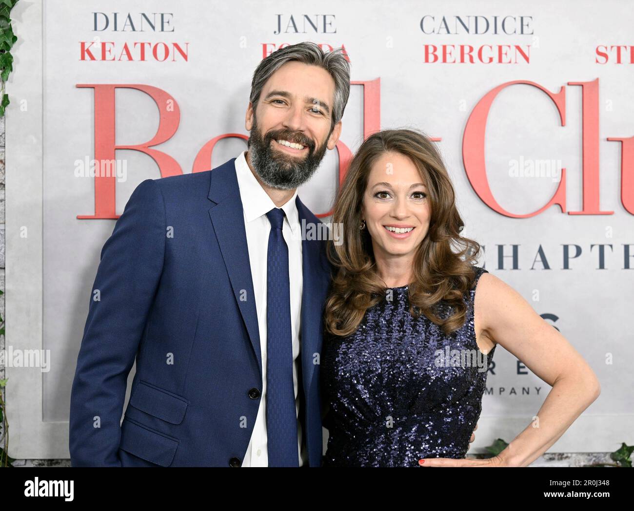 Director, co-writer and producer Bill Holderman, left, poses with co ...