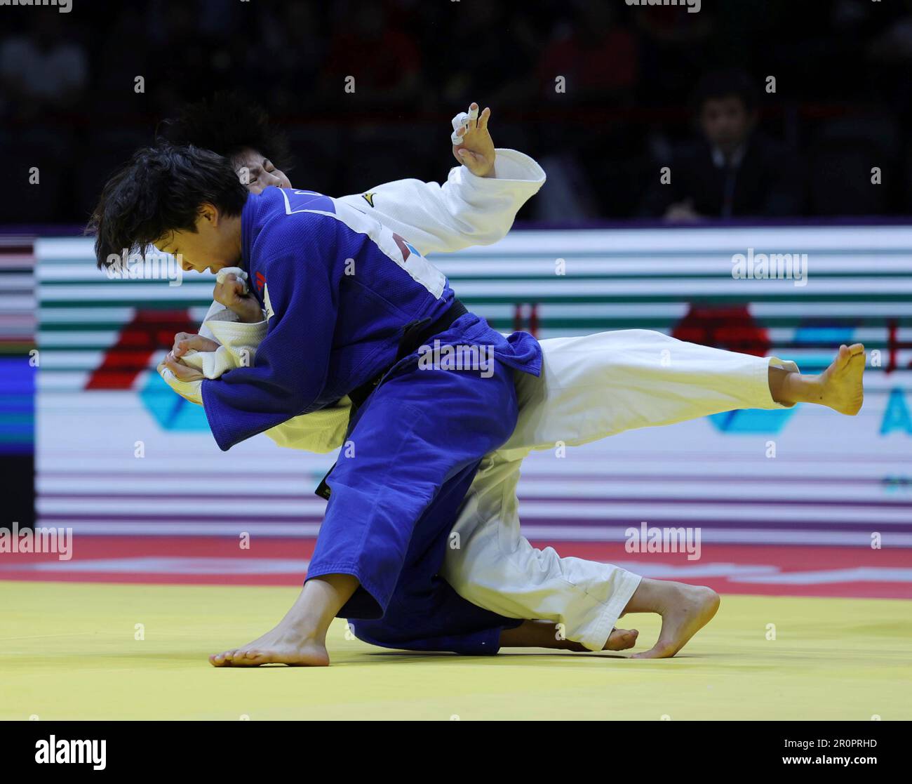 Haruka Funakubo of Japan (white) and Christa Deguchi of Canada (blue ...