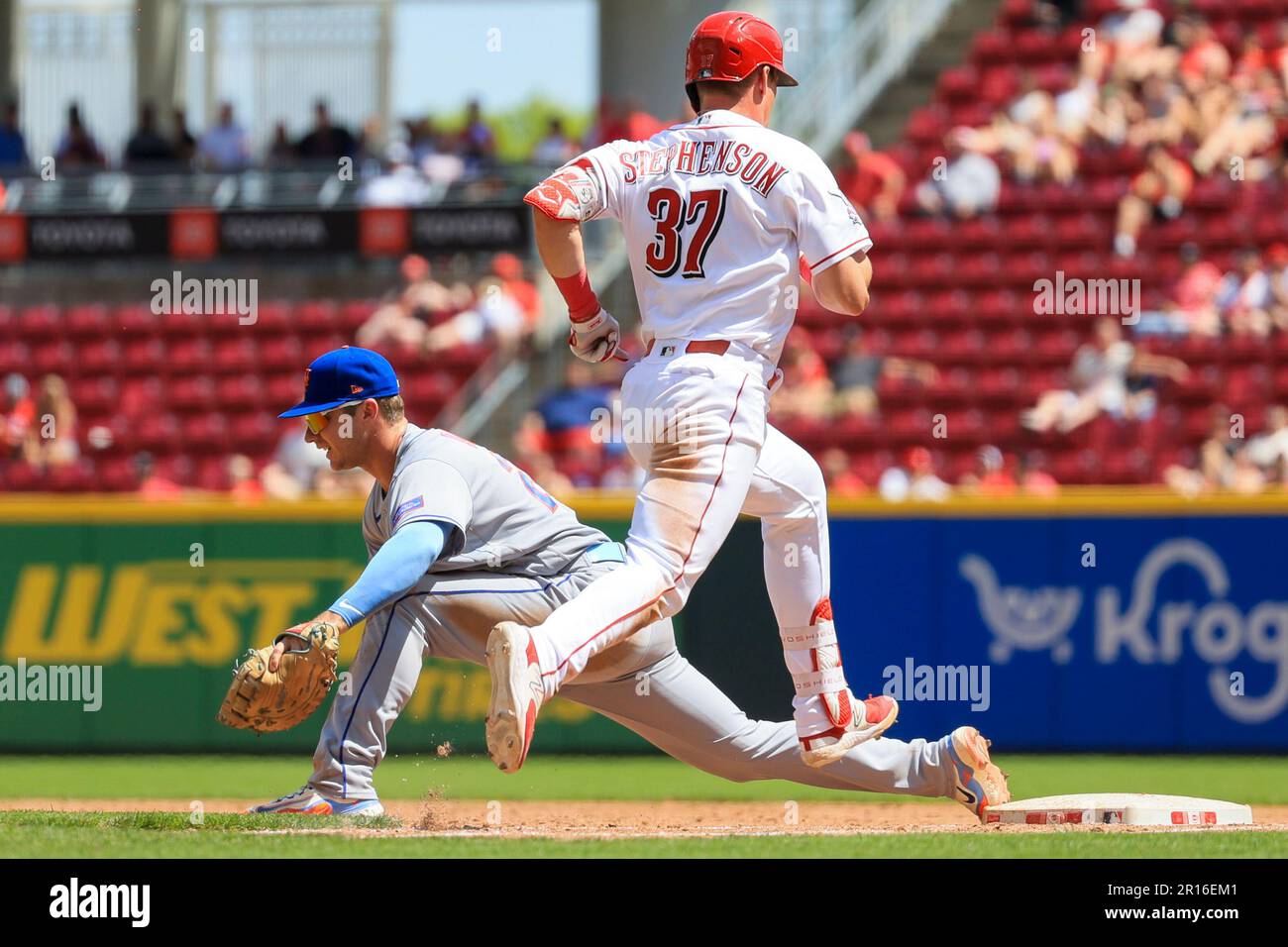 Cincinnati Reds' Tyler Stephenson runs to first base as New York Mets ...