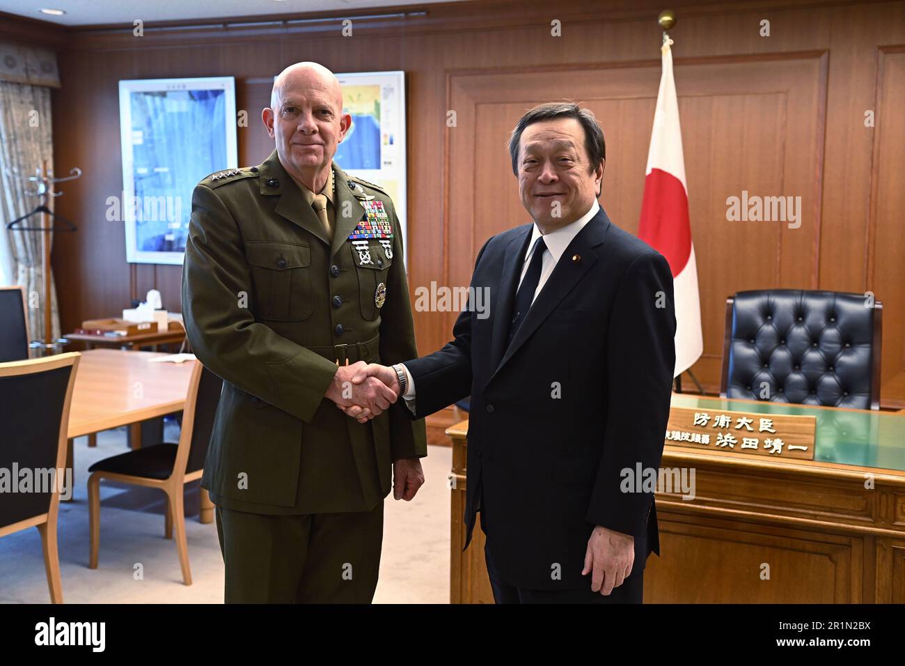Maj. Gen. David H. Berger, left, commandant of the U.S. Marine Corps ...