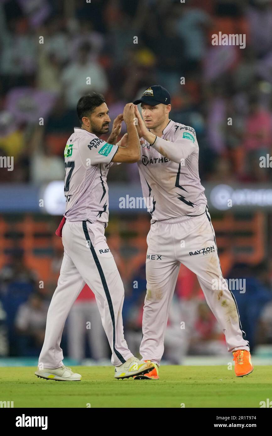 Gujarat Titans' Mohit Sharma, left, celebrates the wicket of Sunrisers ...