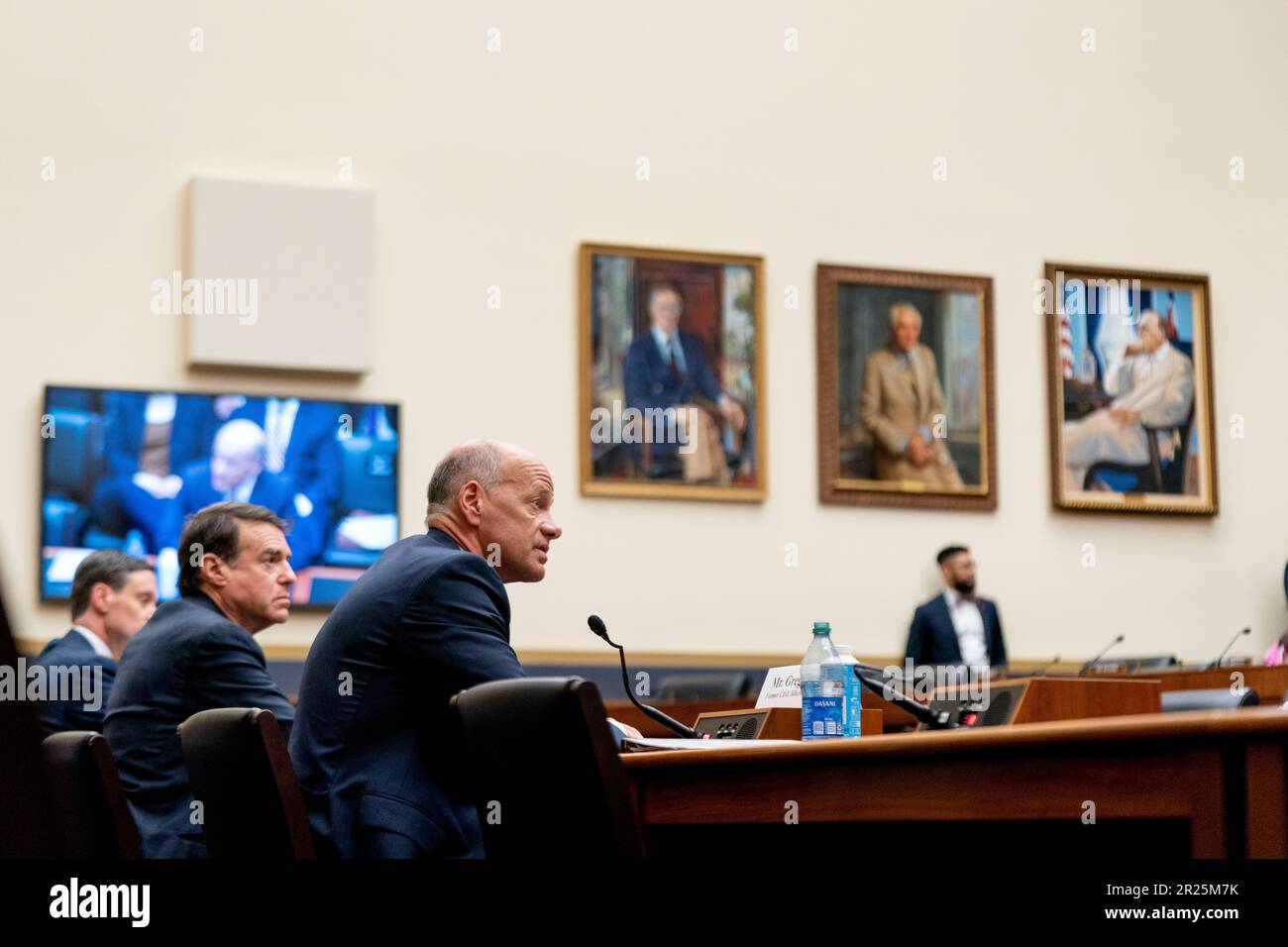 Former Silicon Valley Bank CEO Greg Becker, right, accompanied by ...