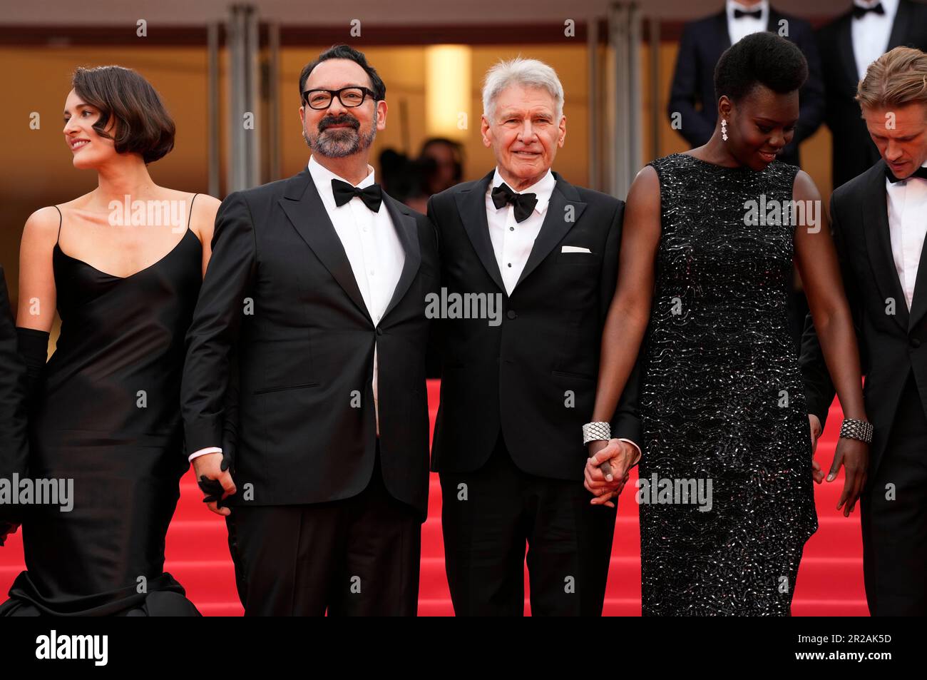 Phoebe Waller-Bridge, from left, director James Mangold, Harrison Ford ...