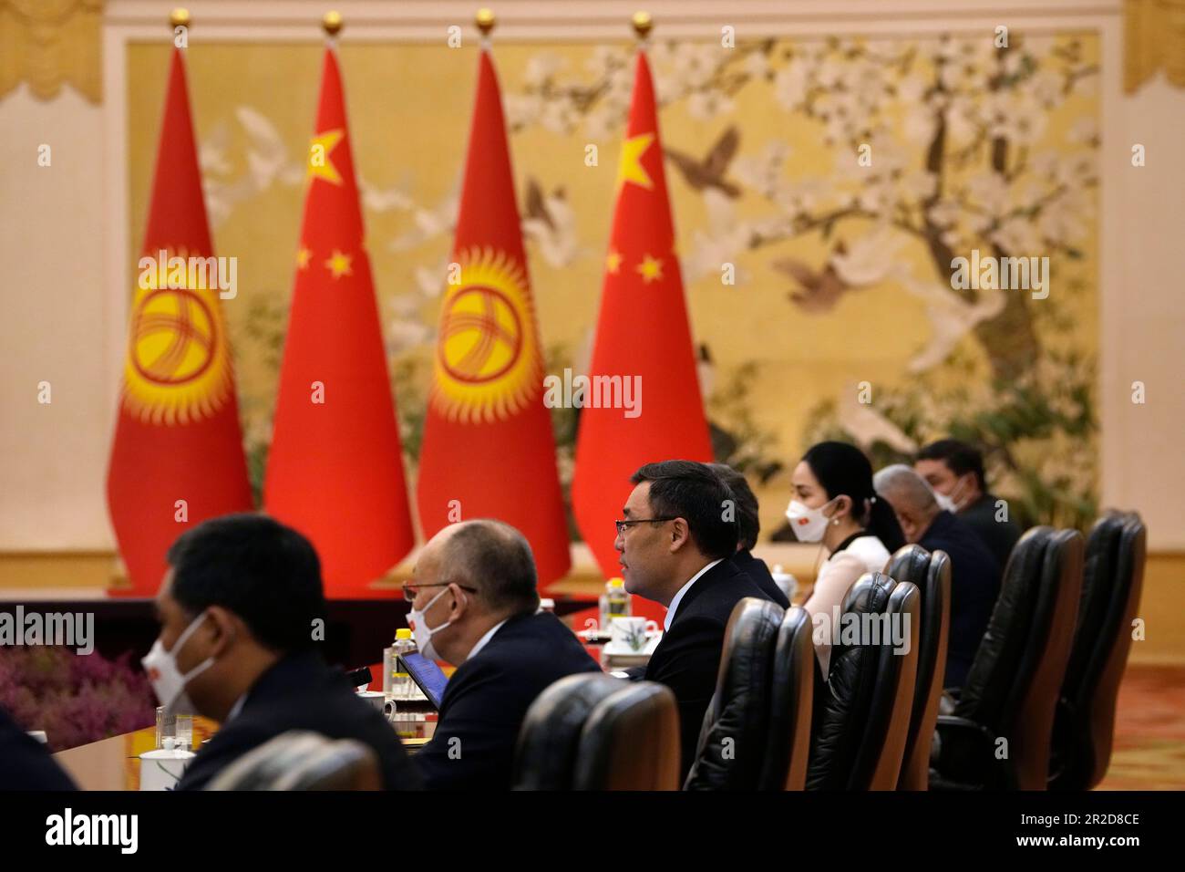 Kyrgyz President Sadyr Japarov, center, speaks during a meeting with ...