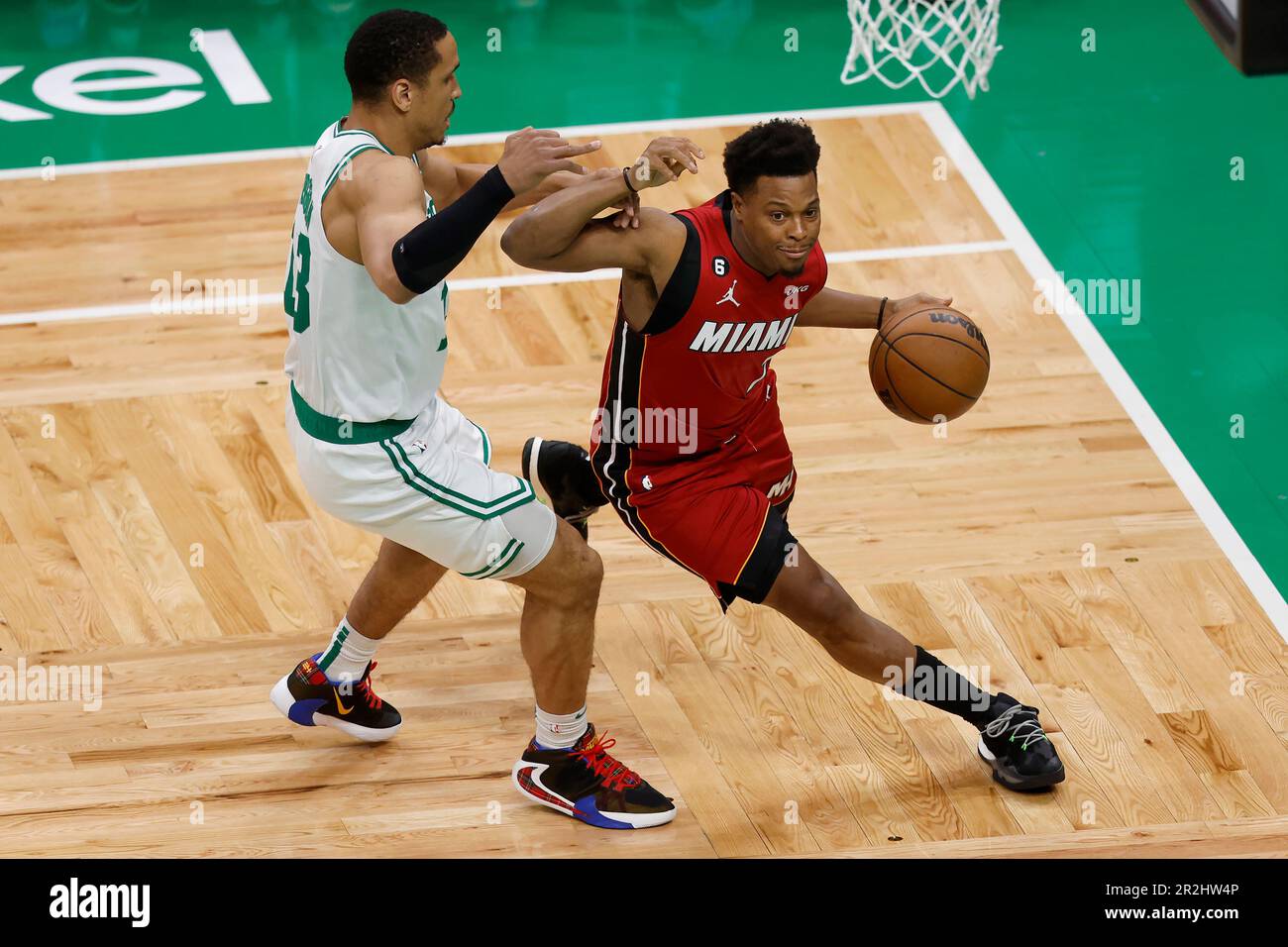Miami Heat guard Kyle Lowry, right, drives to the basket against Boston ...