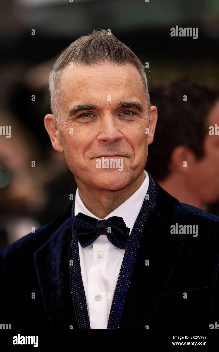 Robbie Williams poses for photographers upon arrival at the premiere of ...