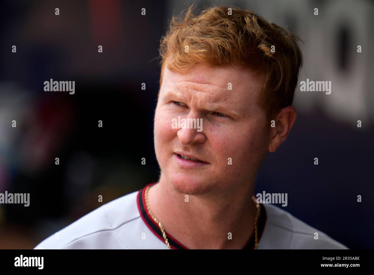 Arizona Diamondbacks' Pavin Smith walks in the dugout before a baseball ...