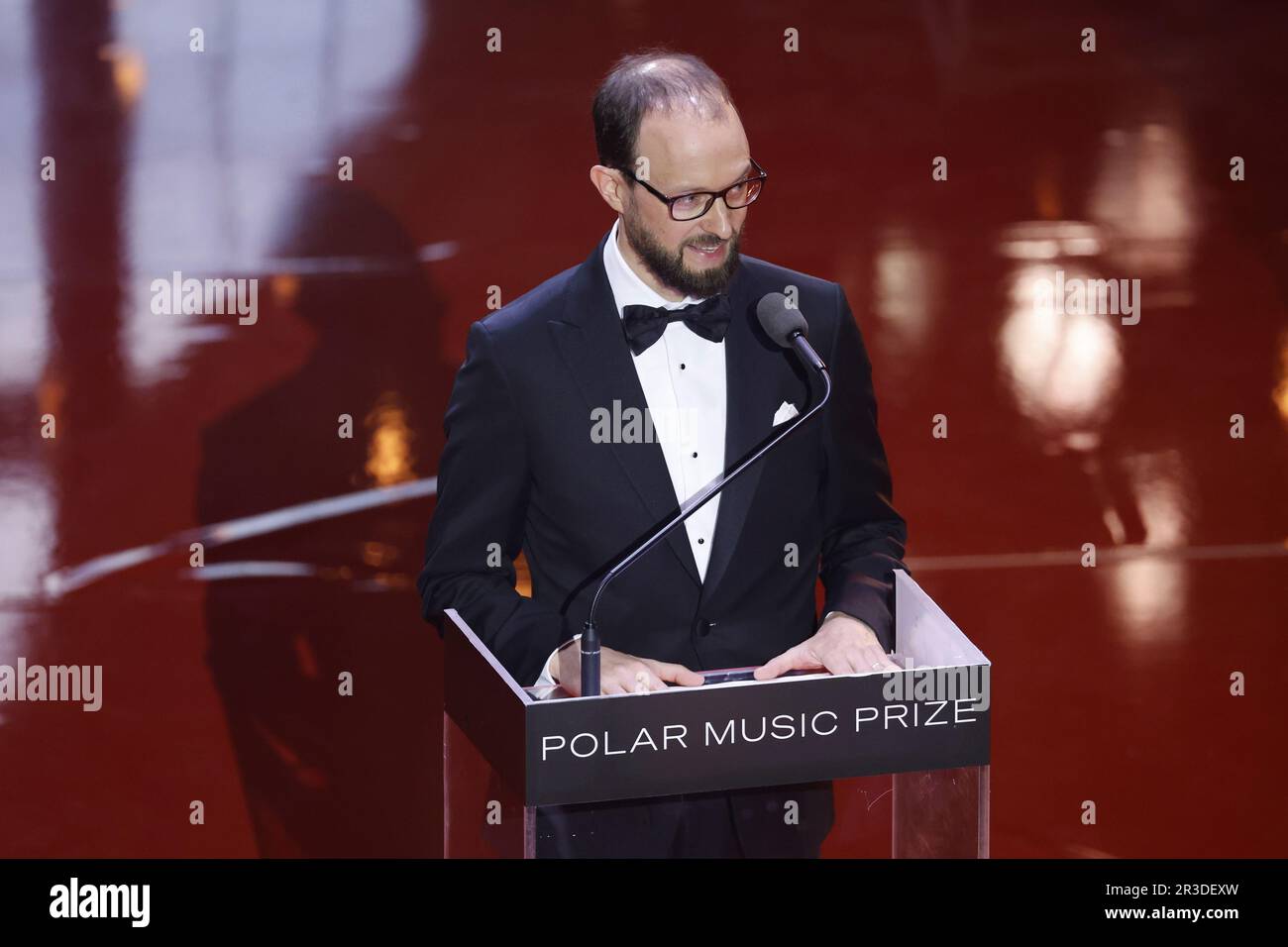 Michael Part, the son of laureate Arvo Part, gives a speech after ...