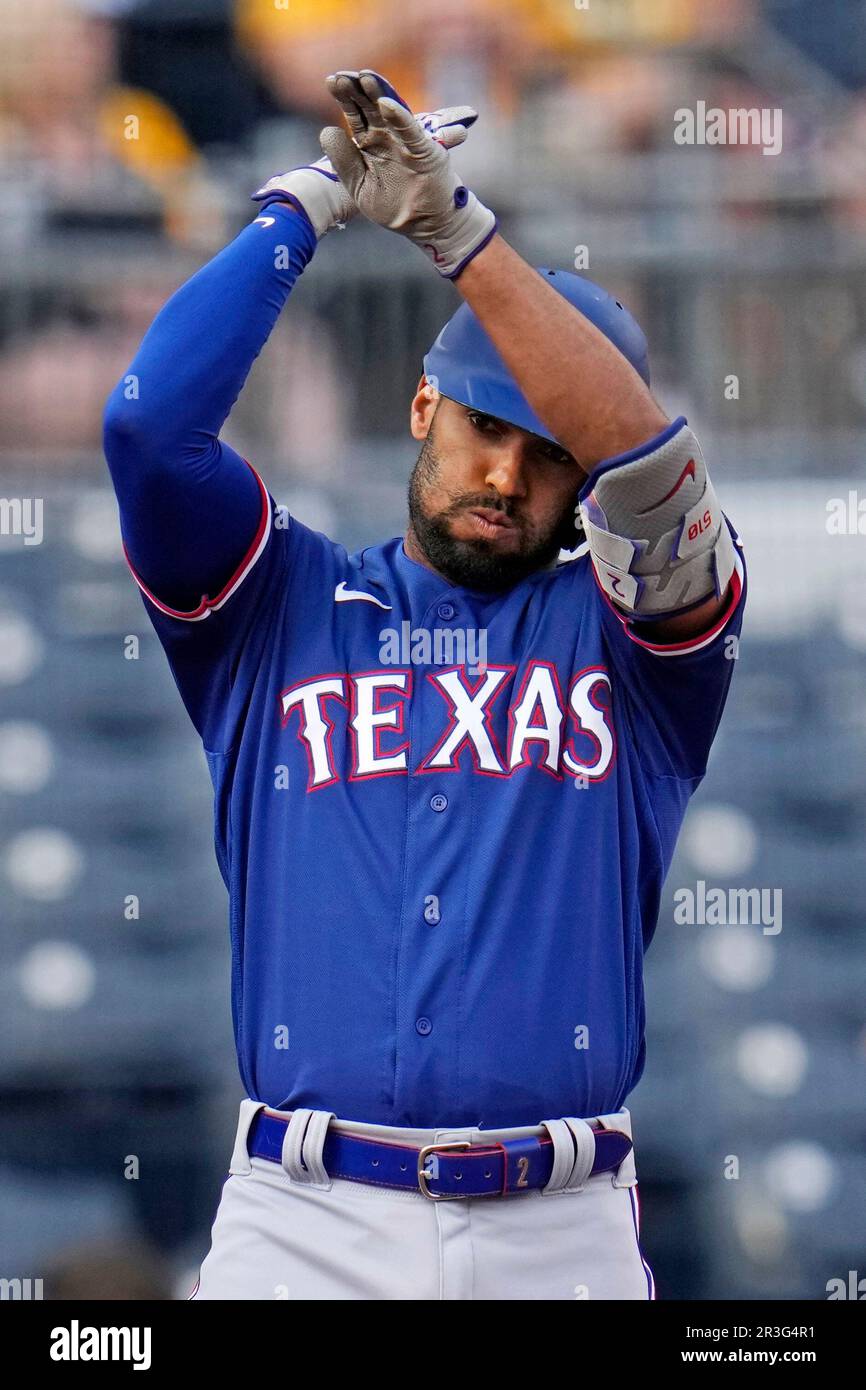 Texas Rangers' Marcus Semien celebrates as he stands on third base ...