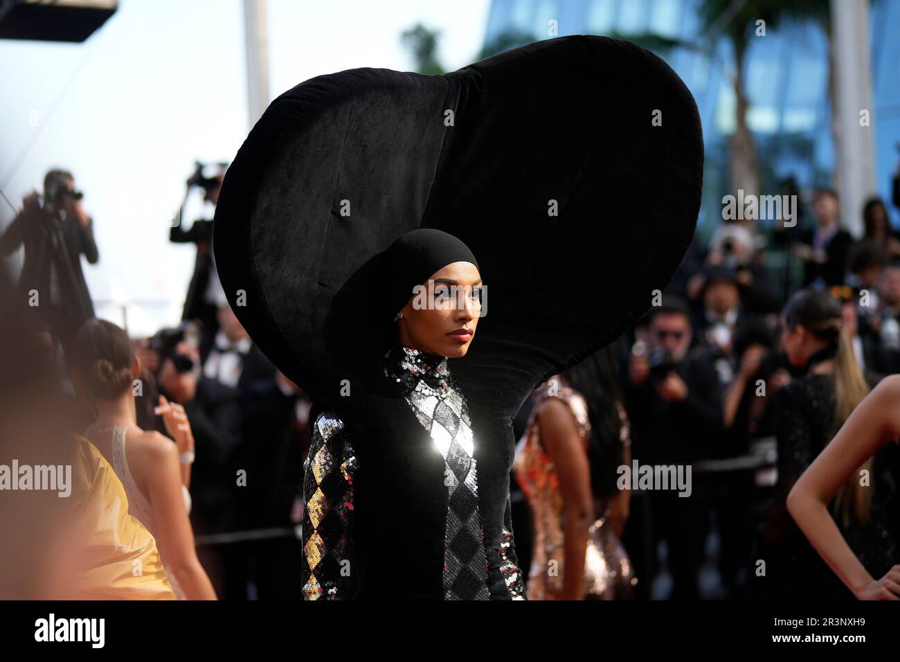Ikram Abdi poses for photographers upon arrival at the premiere of the ...