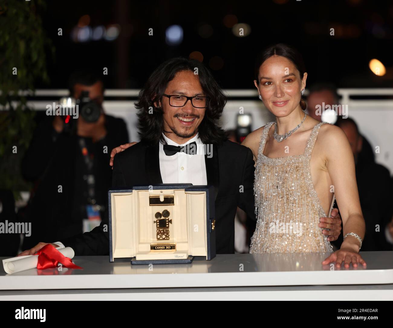 Pham Thien An, left, winner of the Camera d'or award for 'Inside The Yellow Cocoon Shell,' poses ...
