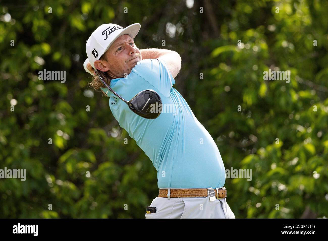 Captain Cameron Smith of Ripper GC hits his shot from the 14th tee ...