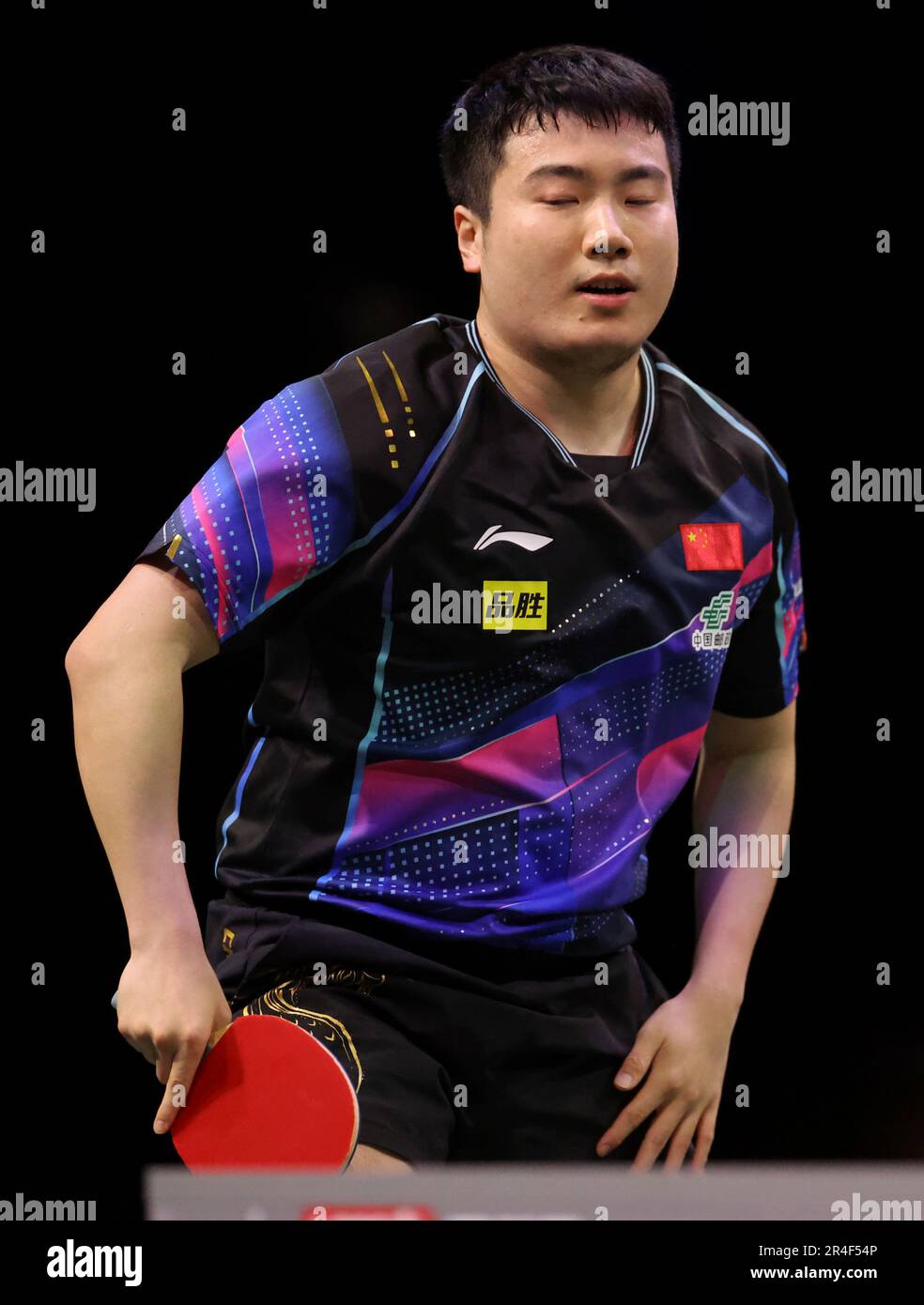 LIANG Jingkun of China competes during men's singles semifinal match ...