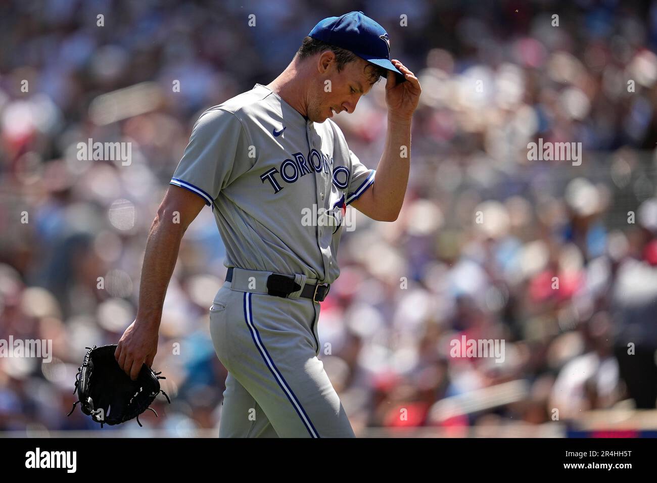 Toronto Blue Jays starting pitcher Chris Bassitt walks back to the ...