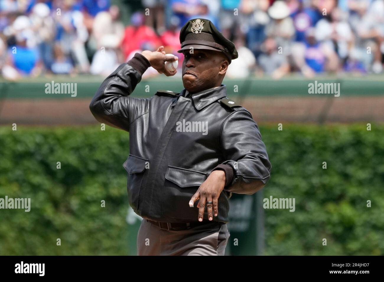 United States Army LTC Shane Doolan throws out a ceremonial first pitch ...