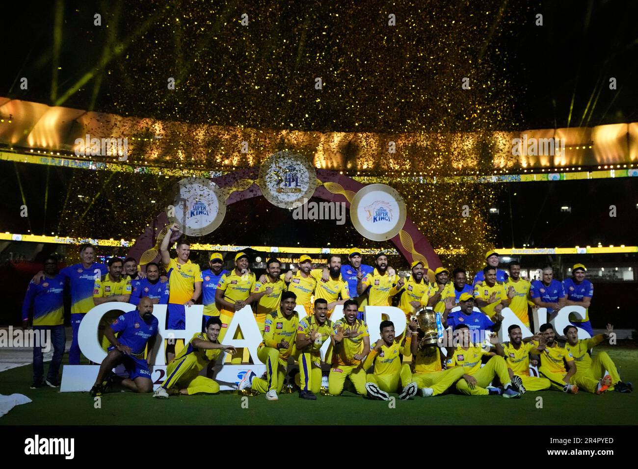 Chennai Super Kings players celebrate with the winners trophy after ...