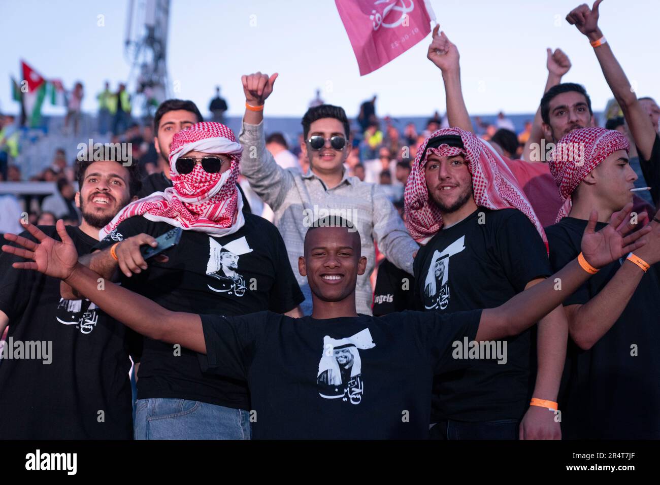 Jordanian men wearing the traditional Jordanian red and white checkered ...