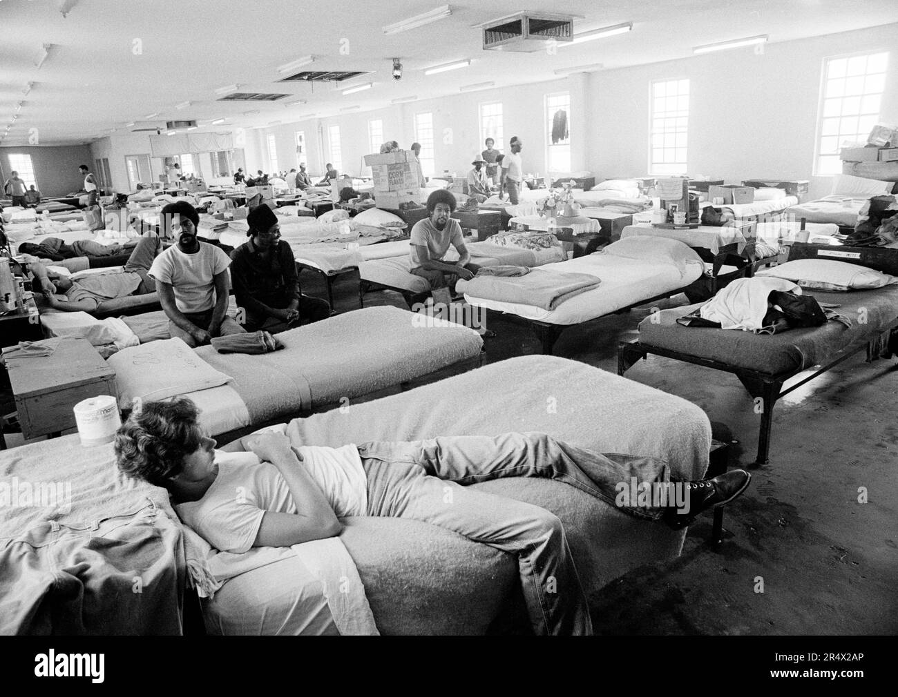 Prisoners shown in the cramped sleeping area for Camp A at the ...